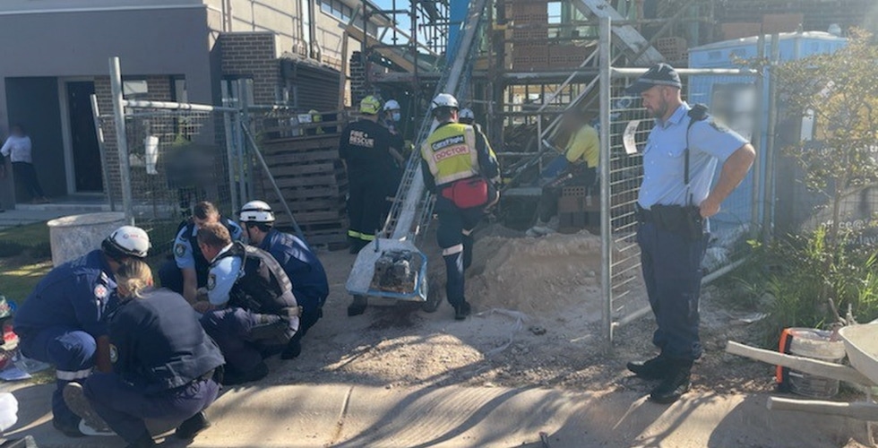 Man trapped under two-storey home following construction collapse ...